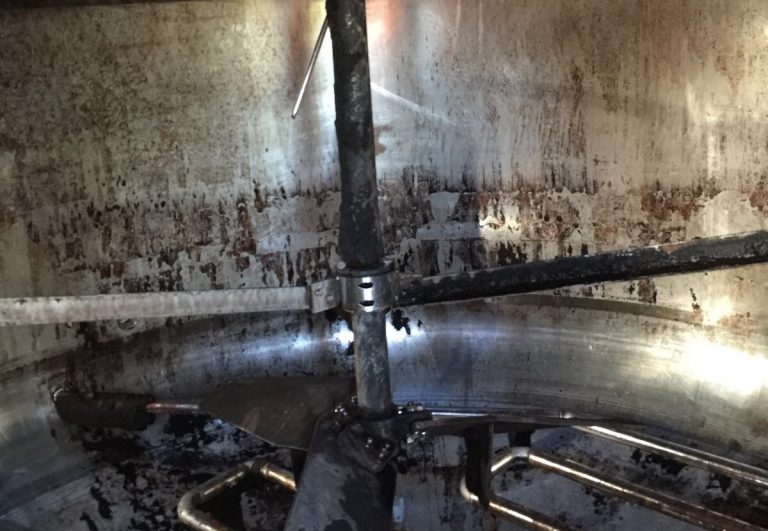 Removing 15 Years of Debris with Industrial Tank Cleaning